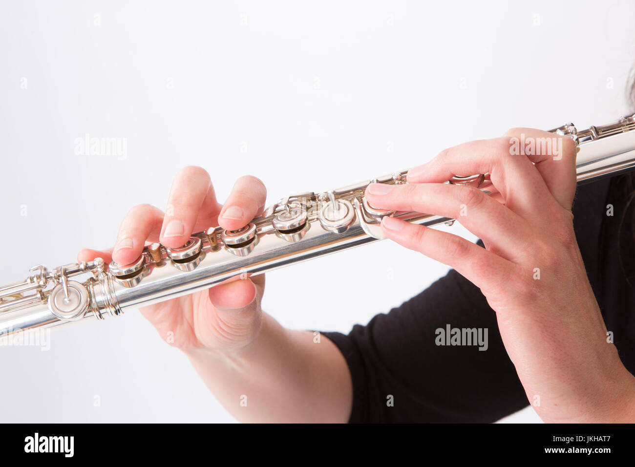 flute player's hands closeup Stock Photo - Alamy