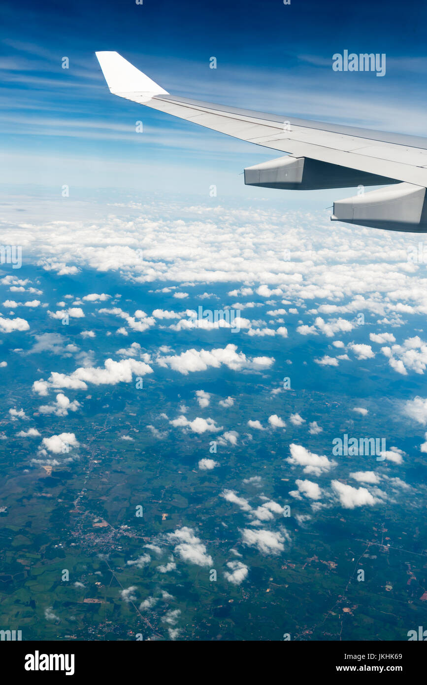 The view from the height of the window jet aircraft. white cloud and ...