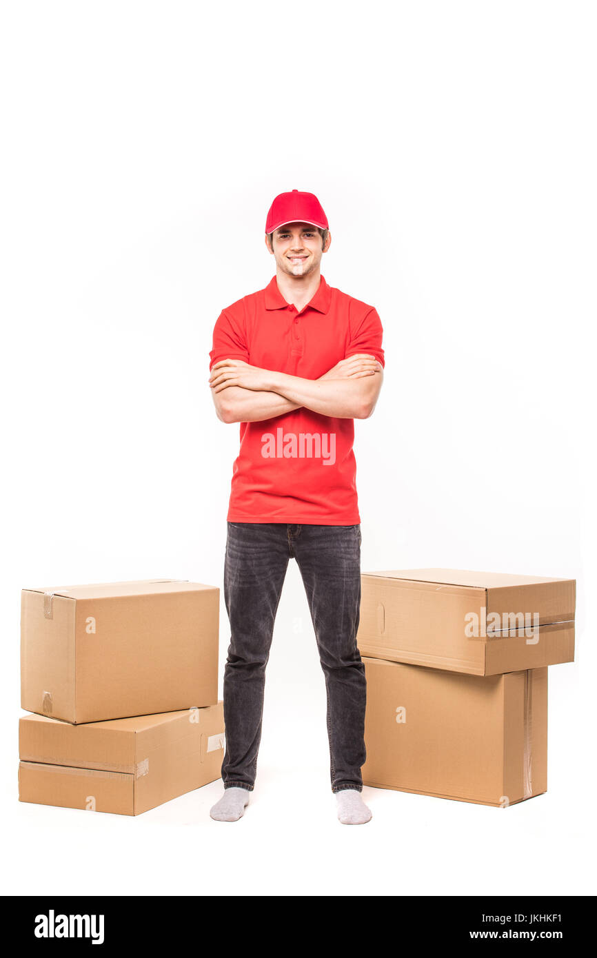 Handsome young delivery man with boxes on white background Stock Photo ...
