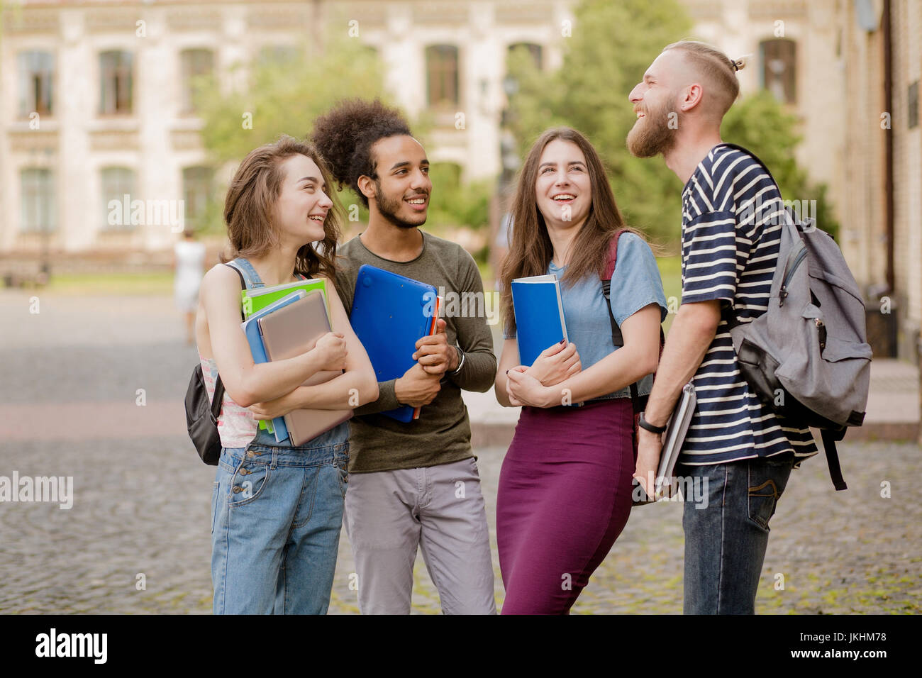 Cheerful young students showing emotions of happiness Stock Photo - Alamy