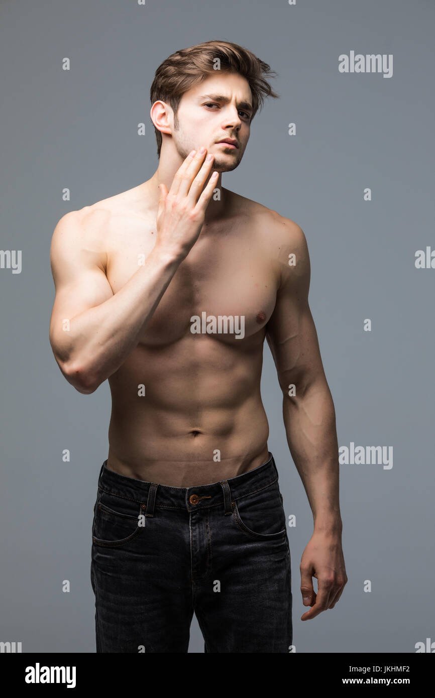 Portrait of strong healthy handsome athletic man fitness model posing ...