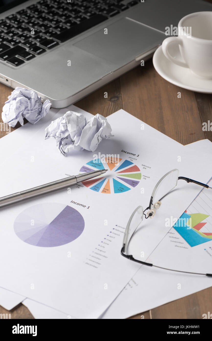 pen on chart paper on work desk, developing a business project and ...