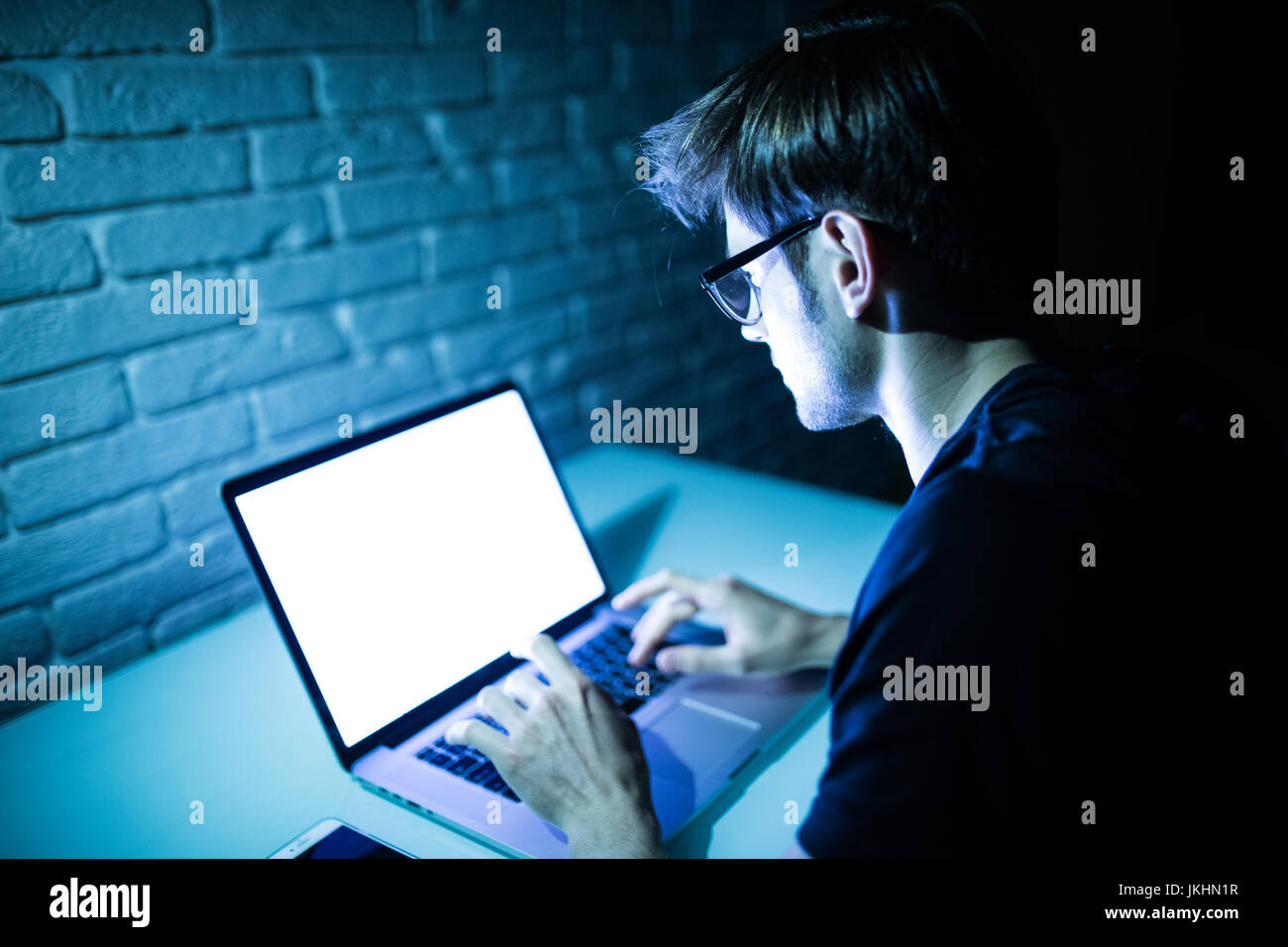 Man using laptop writing programming code on laptop Stock Photo - Alamy Man using laptop writing programming code on laptop Stock Photo - Alamy