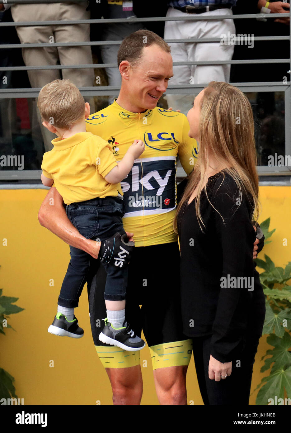 Team Sky's Chris Froome (centre) celebrates victory with his son Kellan ...