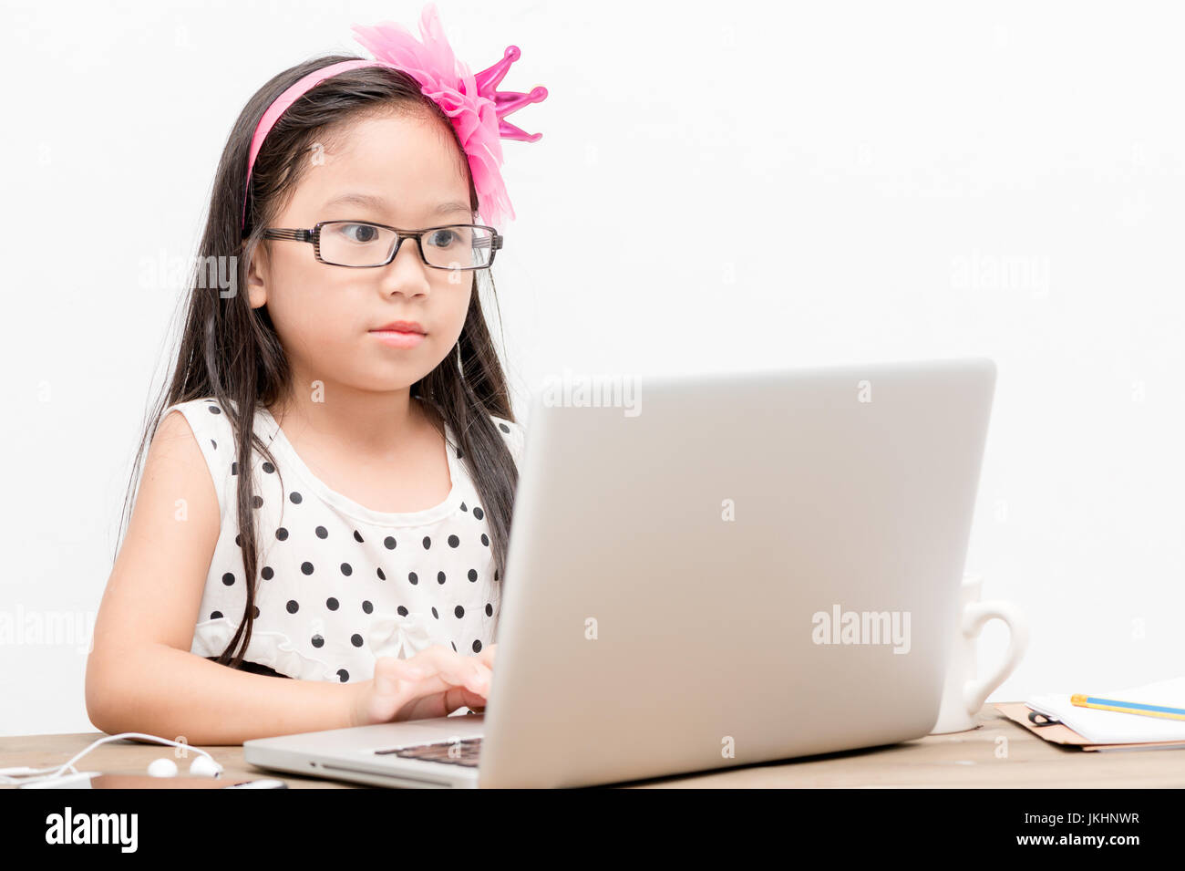 education, technology and internet concept - cute student girl with ...