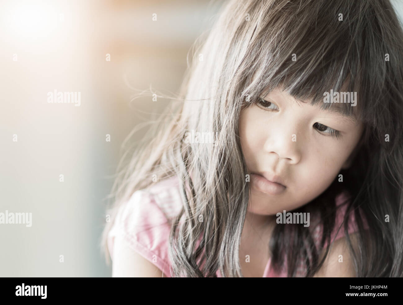 girl feeling alone sad or lonely on vintage tone, with soft focus Stock ...