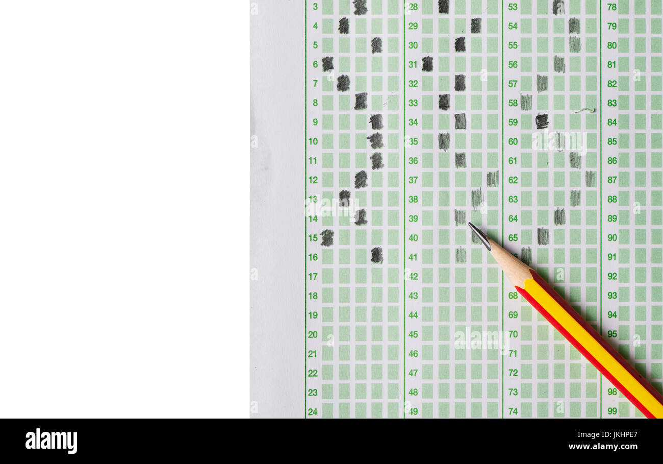 pencil on examination test sheet isolated on white with copy space ...