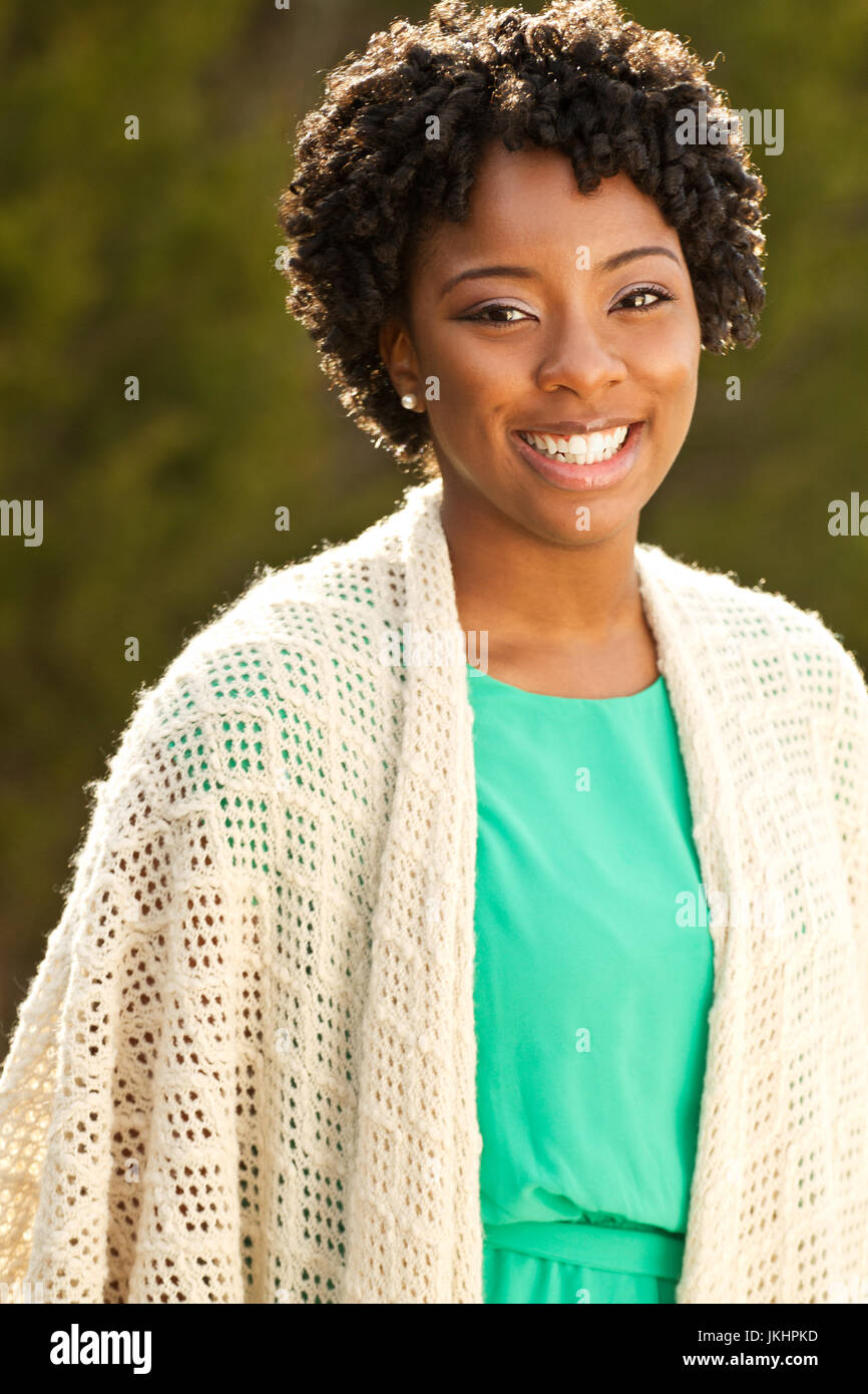 African American woman smiling outside Stock Photo - Alamy