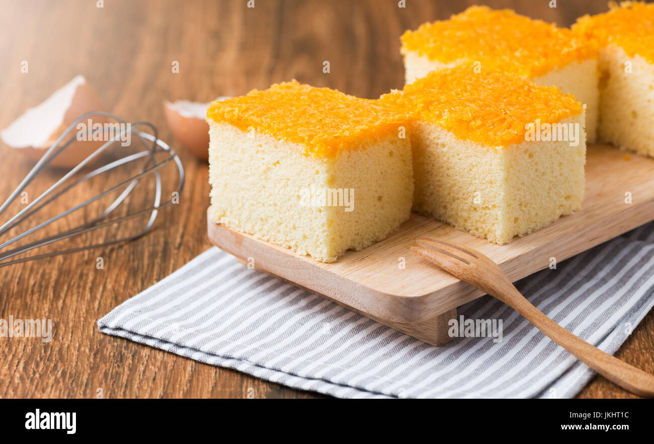 golden threads cake on wood background, Thai dessert made from egg and ...