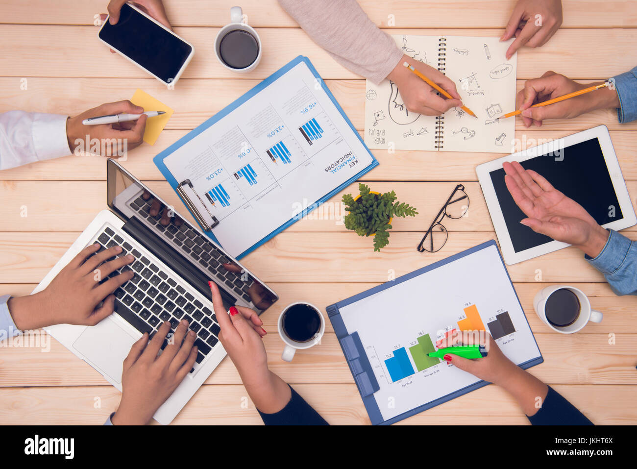 Business meeting top view. Business partners discussing project Stock ...