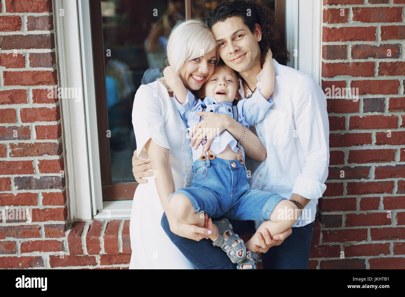 beautiful young family Stock Photo - Alamy