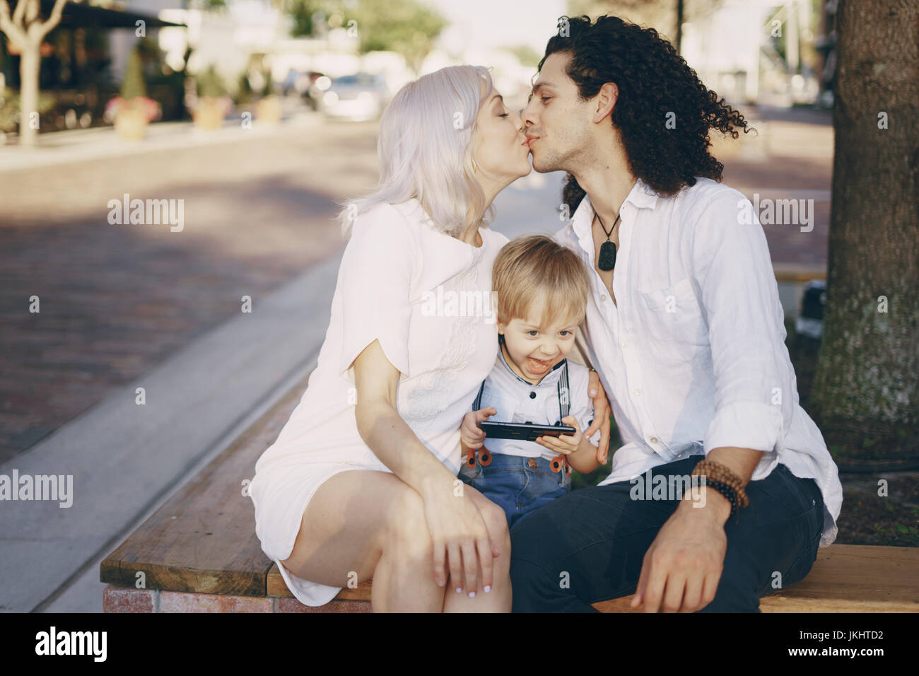 beautiful young family Stock Photo - Alamy