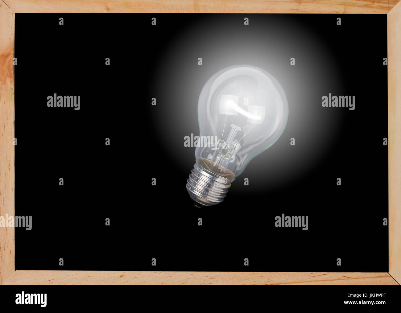 bulb light on black blackboard and copyspace Stock Photo - Alamy