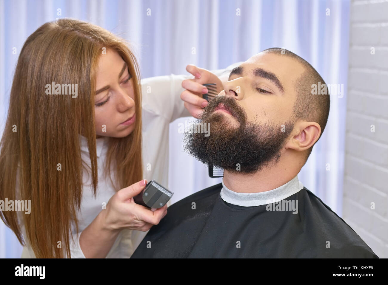 Beard grooming process Stock Photo - Alamy