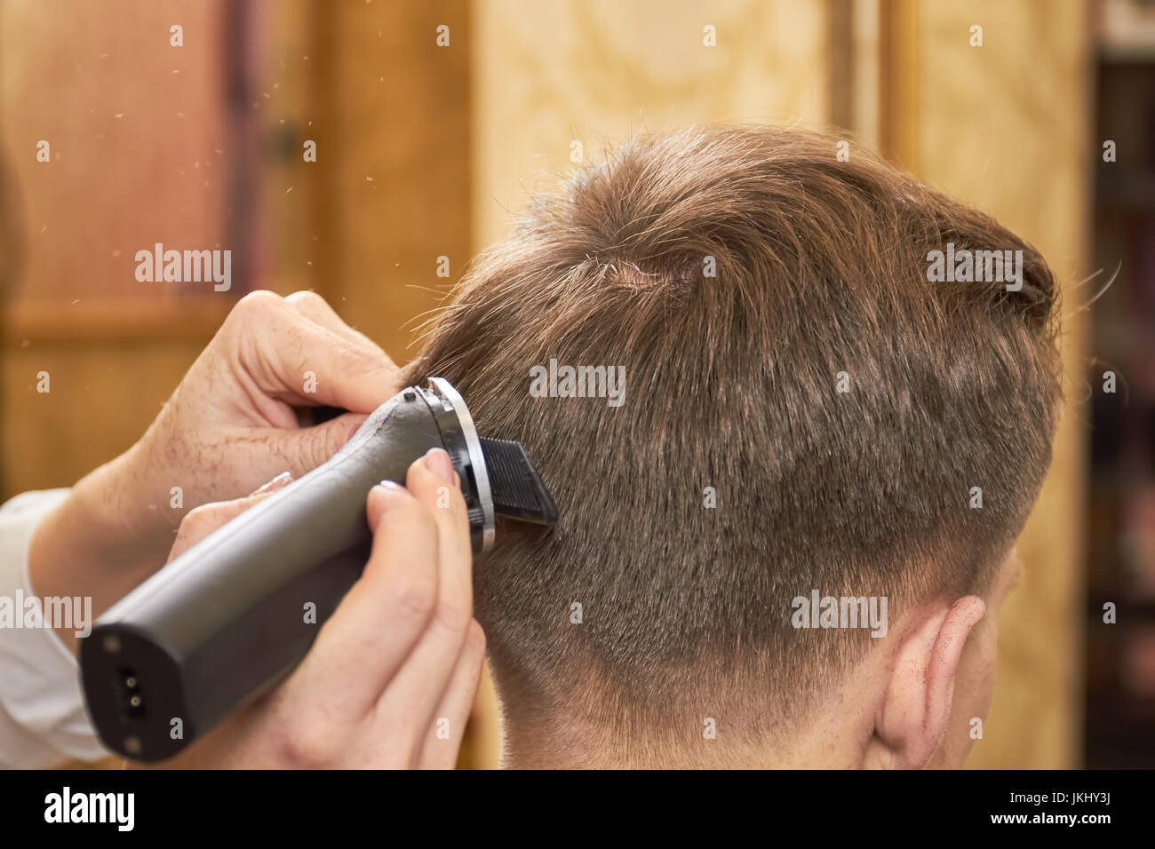 Man getting haircut close up Stock Photo - Alamy