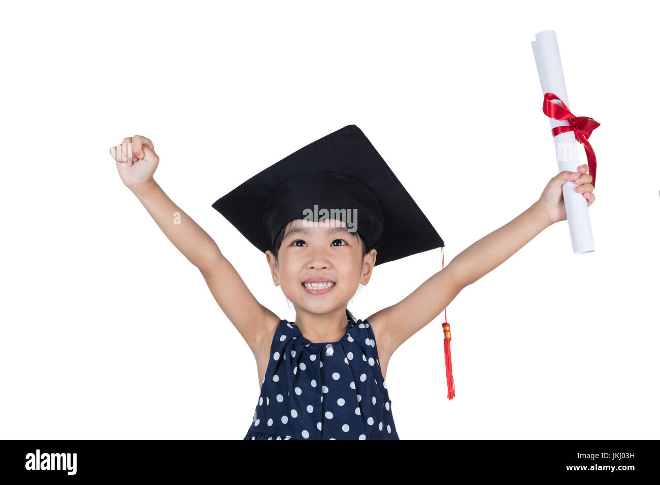 Asian Little Chinese girl wearing graduation cap and holding diploma in ...