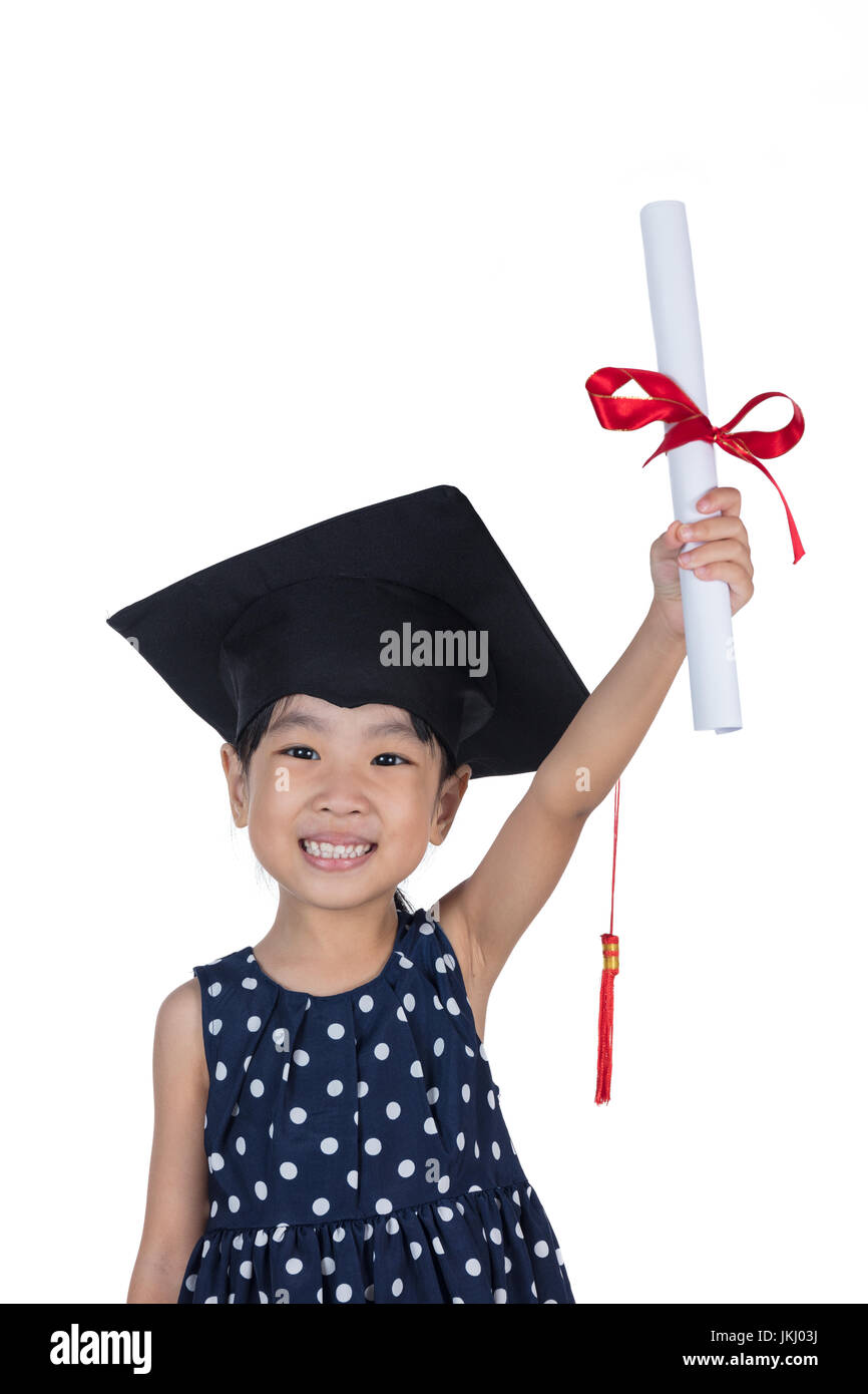 Asian Little Chinese girl wearing graduation cap and holding diploma in ...