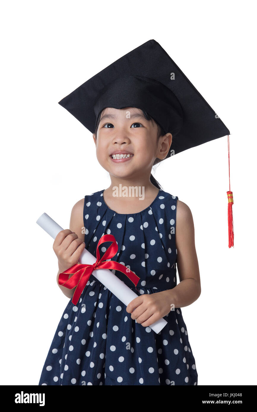 Asian Little Chinese girl wearing graduation cap and holding diploma in ...