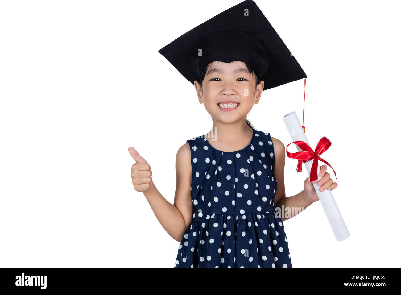 Asian Little Chinese girl wearing graduation cap and holding diploma in ...