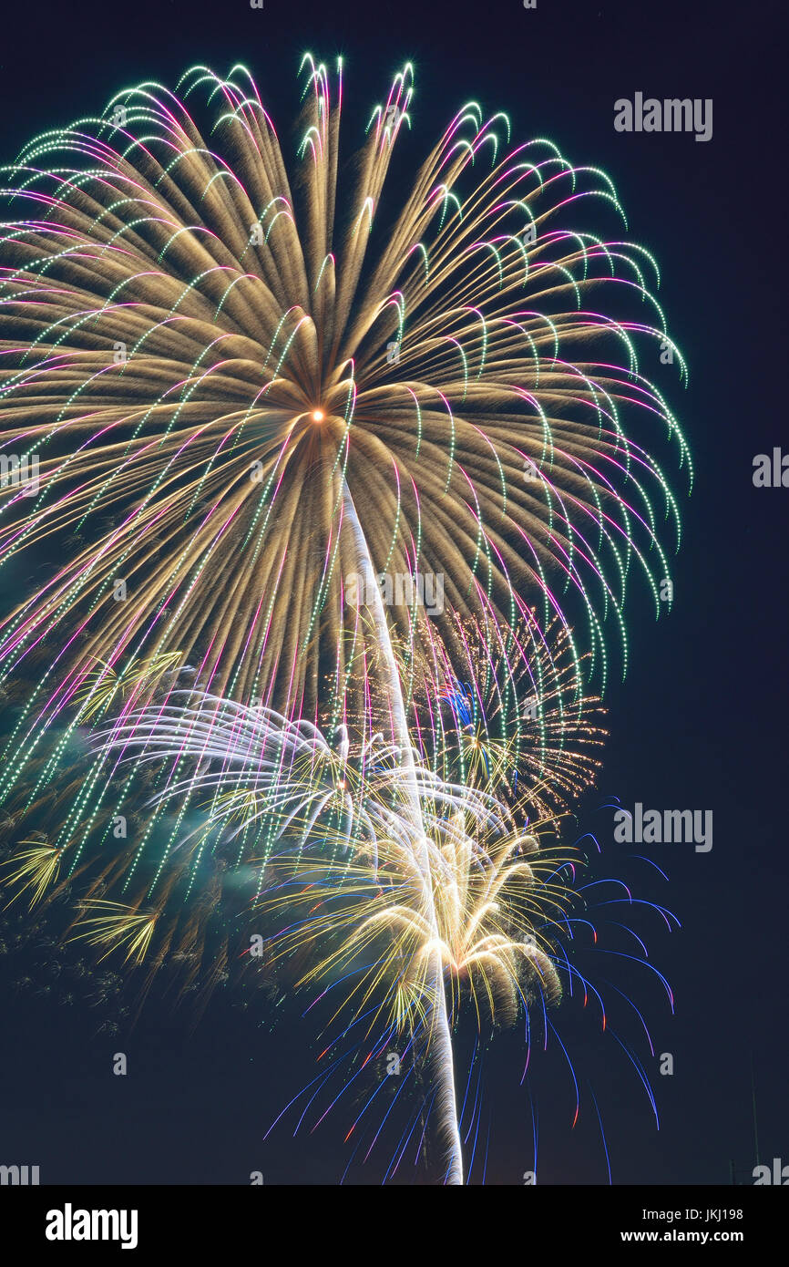 Background colorful Fireworks display in vertical frame Stock Photo - Alamy