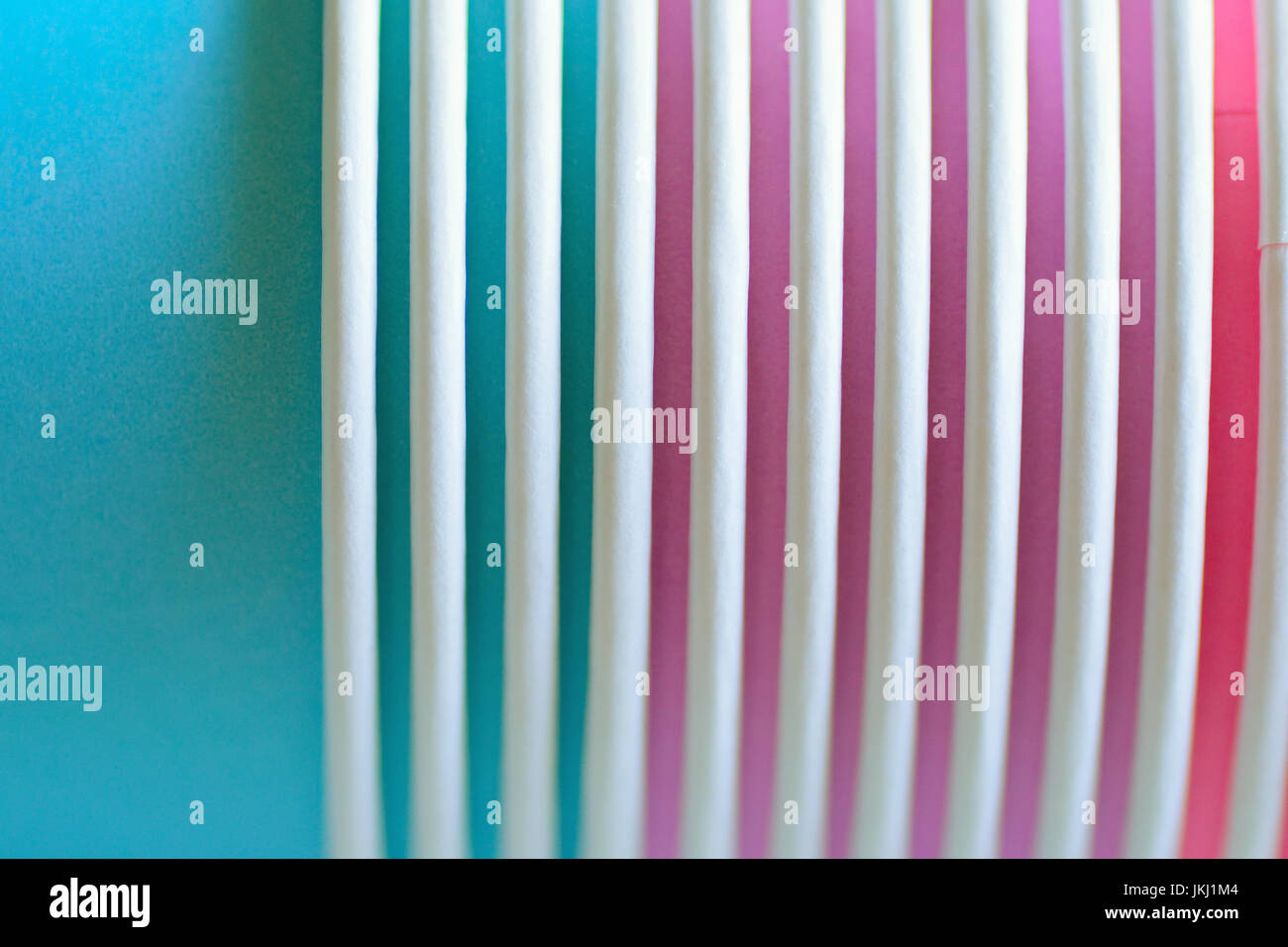 Macro details of lined up colorful paper cups in horizontal frame Stock ...