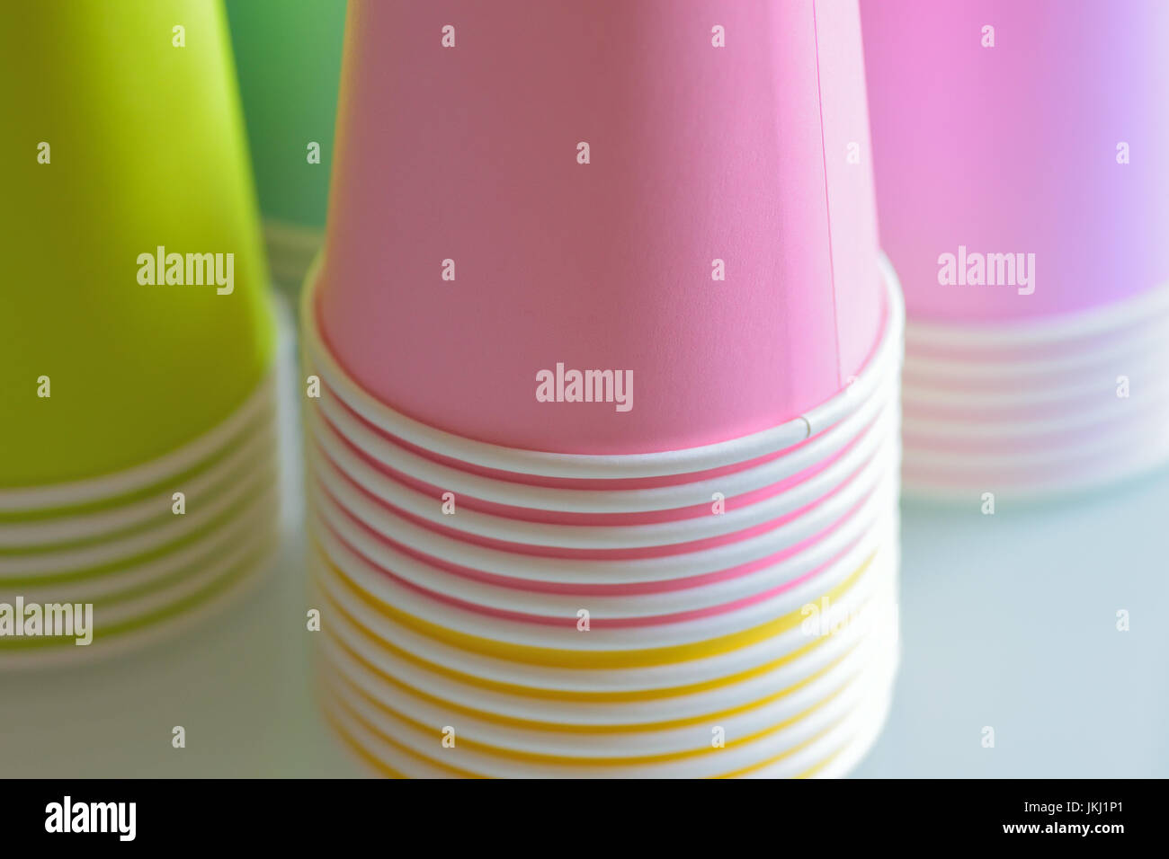 Macro details of lined up colorful paper cups in horizontal frame Stock ...