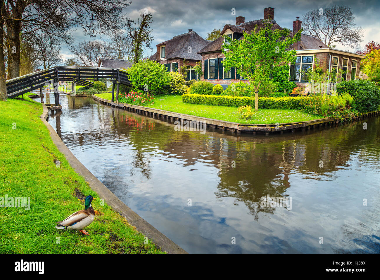 Spectacular traditional dutch village with wooden bridges and water ...