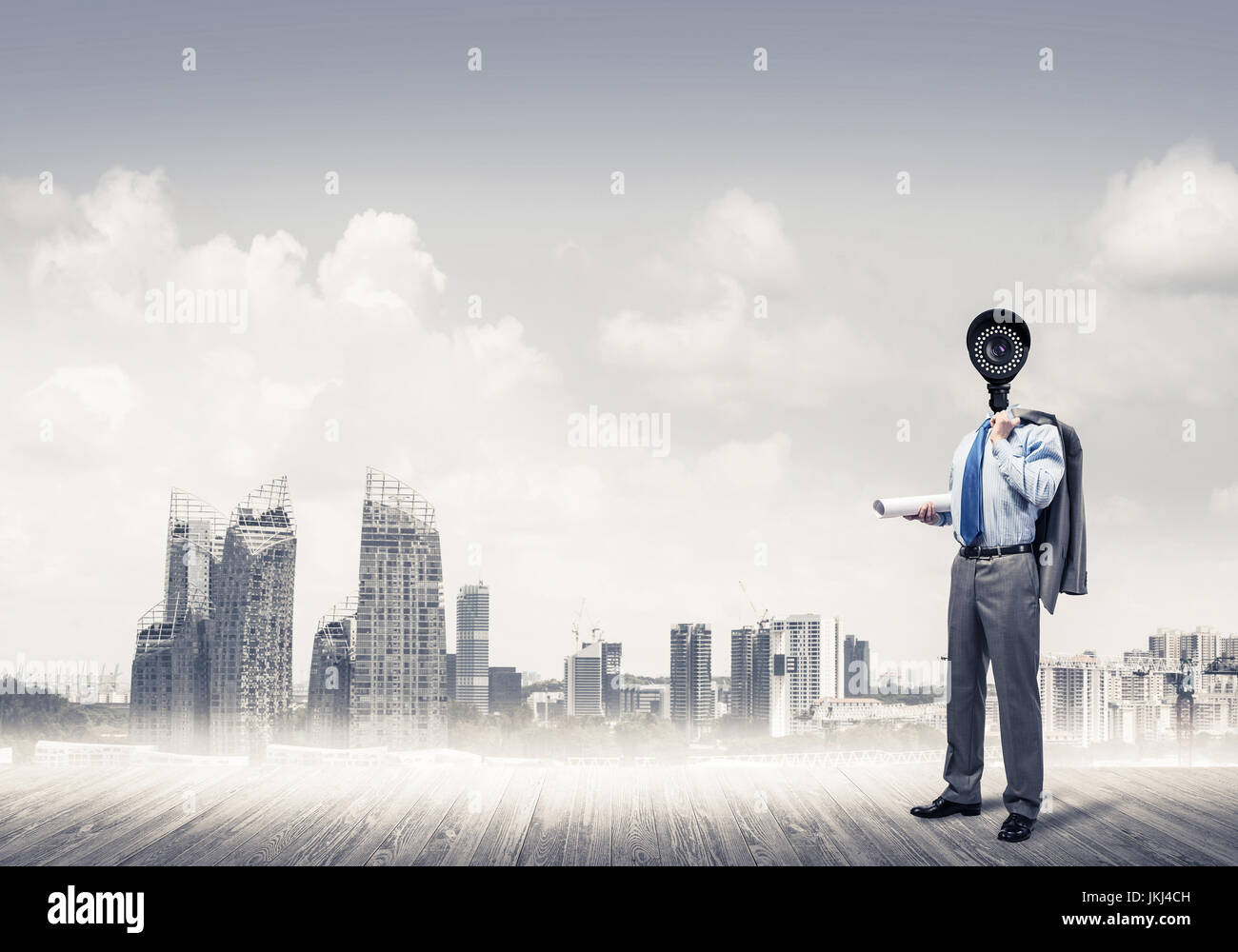 Camera headed man standing on wooden floor against modern citysc Stock ...