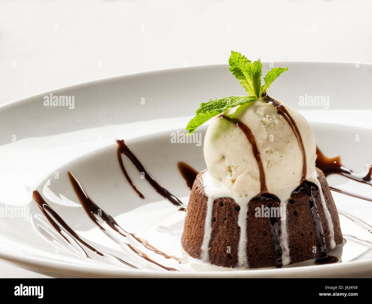 Chocolate fondant with homemade ice cream Stock Photo - Alamy
