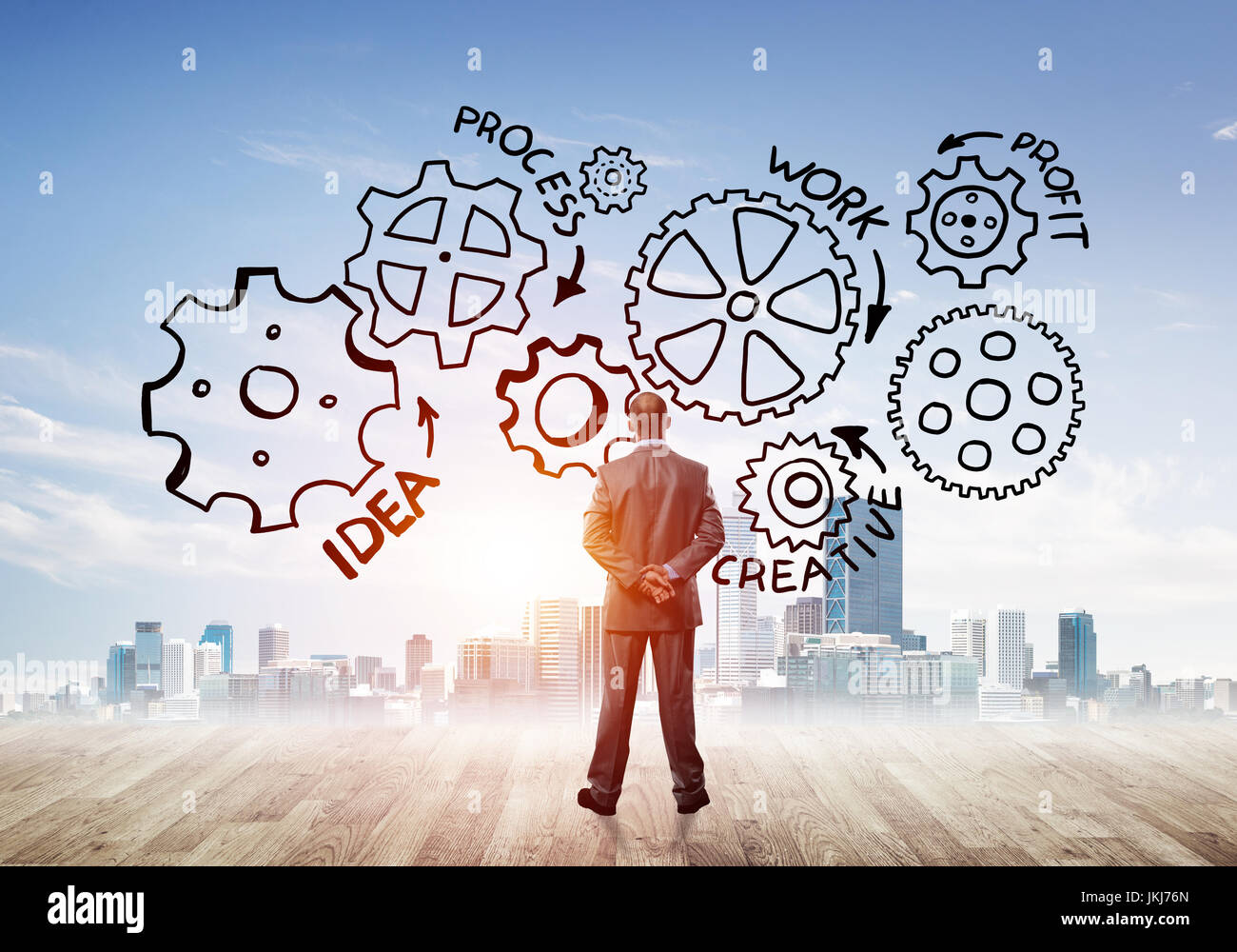 Cogwheel engine drawn on screen as symbol for teamwork and cooperation ...