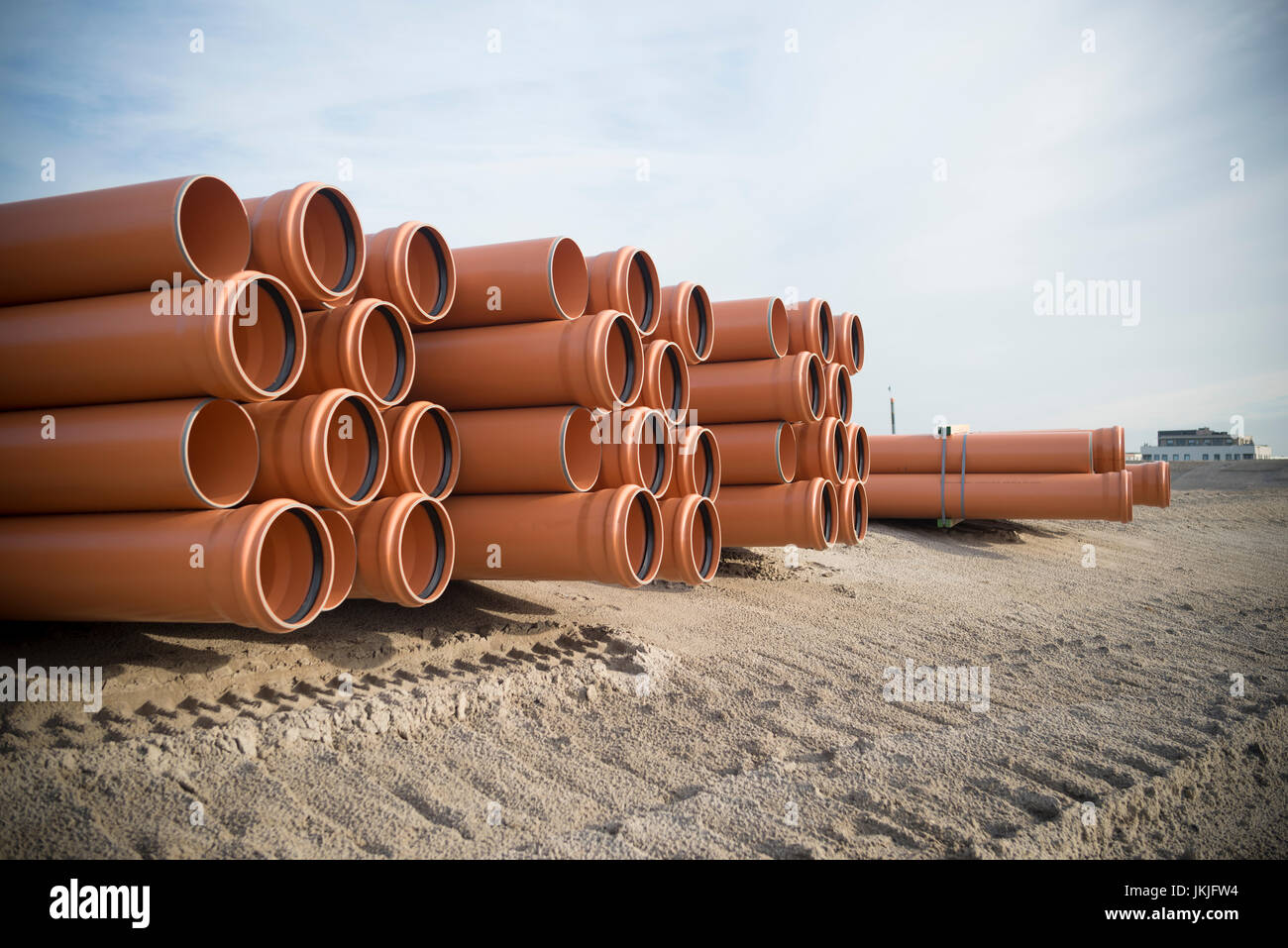 stack of pvc pipes on a construction site Stock Photo - Alamy