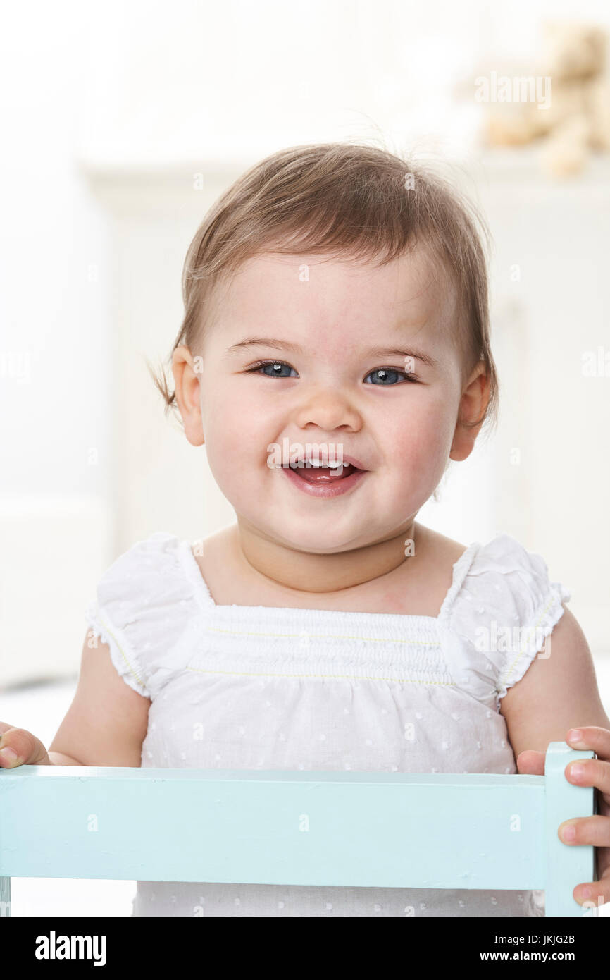 Portrait of relaxed baby girl Stock Photo - Alamy