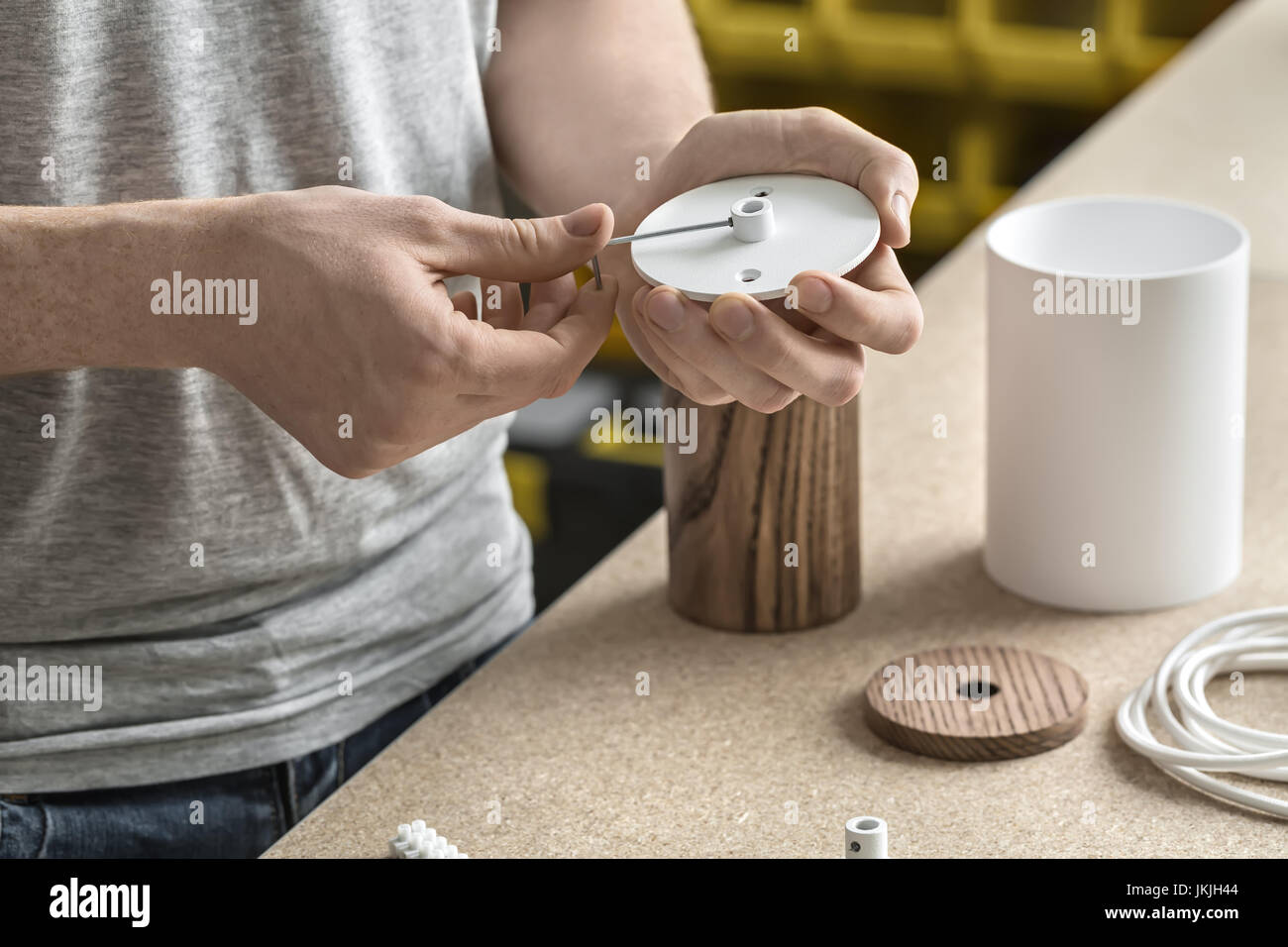 Guy using wrench in workshop Stock Photo - Alamy