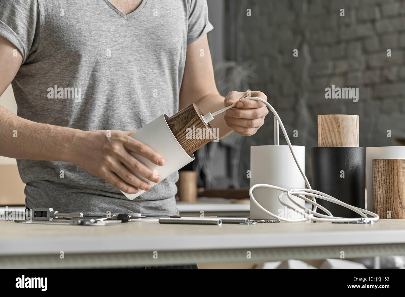 Assembling of lamp in workshop Stock Photo - Alamy
