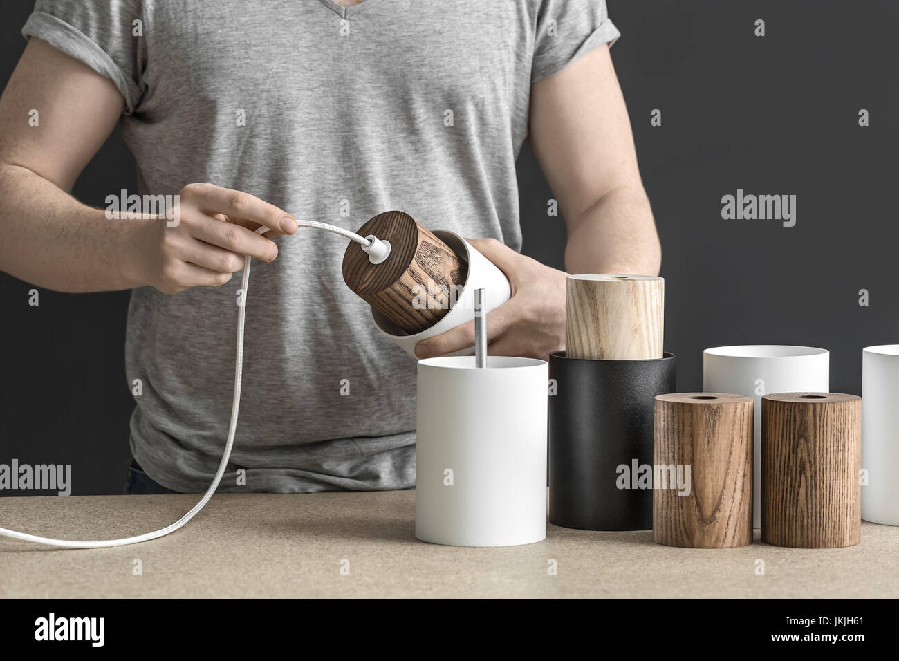 Assembling of lamp in workshop Stock Photo - Alamy