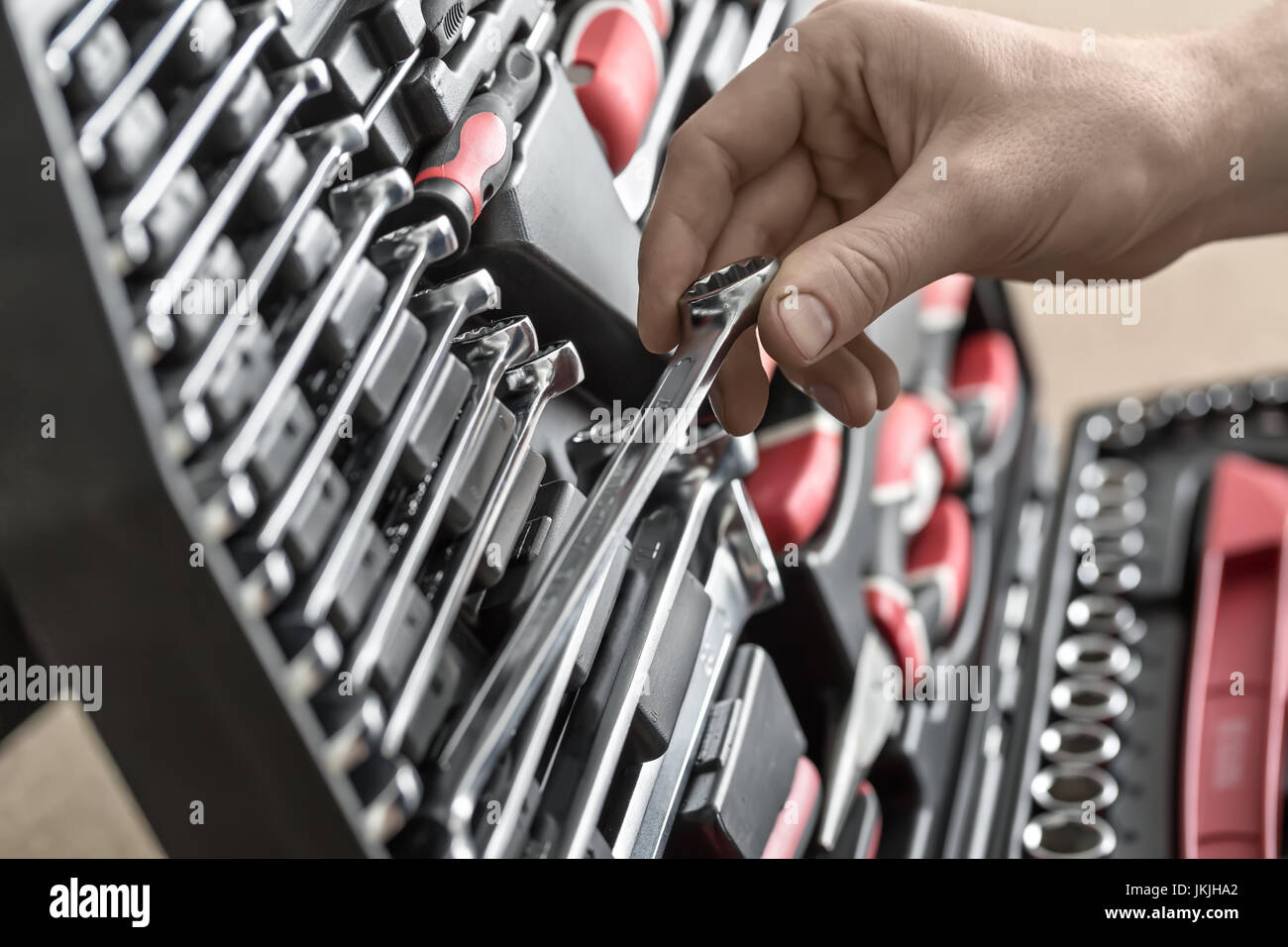 Open toolbox and male hand Stock Photo - Alamy