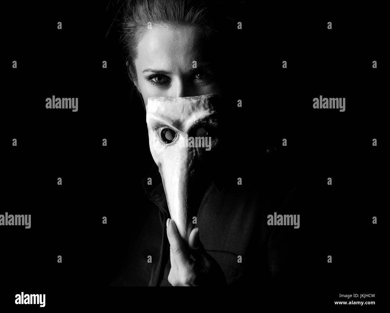 Hiding behind the mask hi-res stock photography and images - Alamy