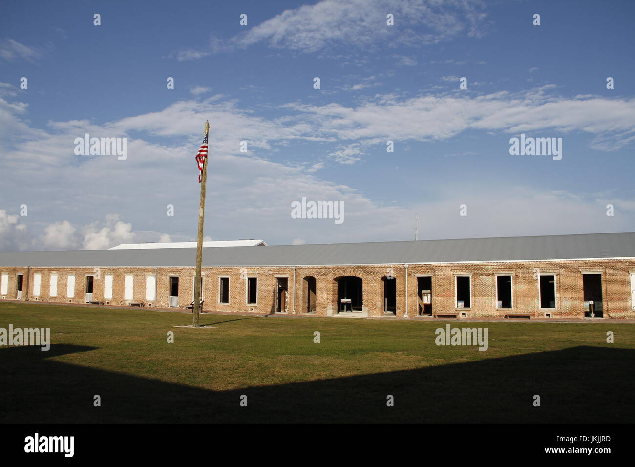 Barracks at Fort Zachary Taylor with the United States flag in ...