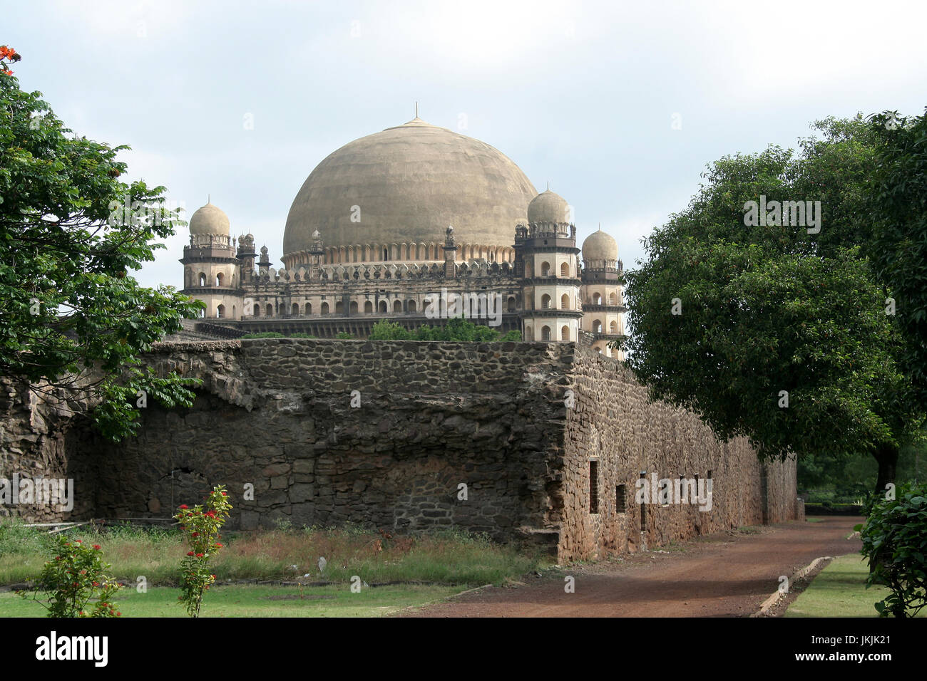 Gol Gumbaz seen behind the walls of nearby structure, Bijapur ...