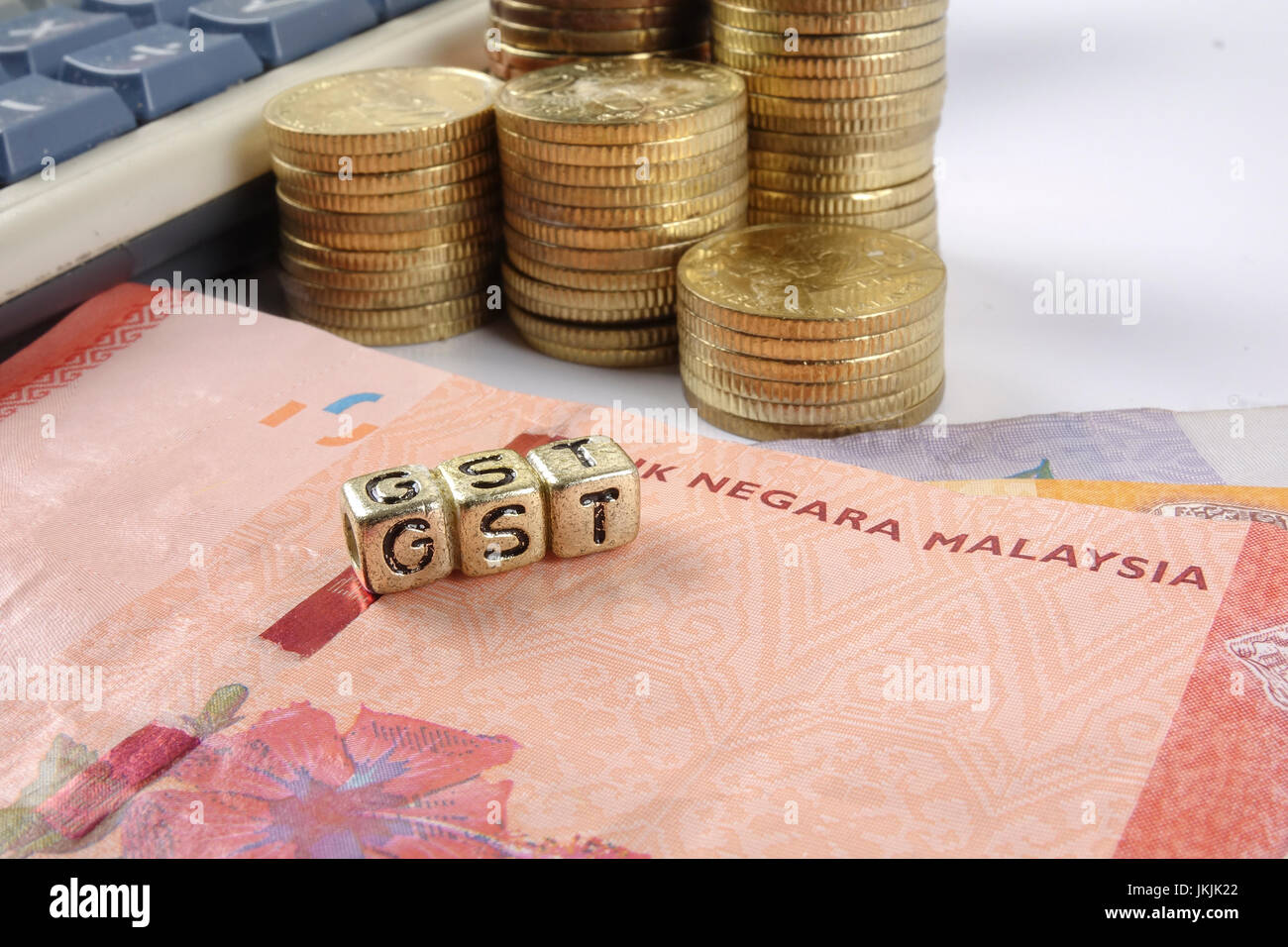 GST wording and gold coins Stock Photo - Alamy