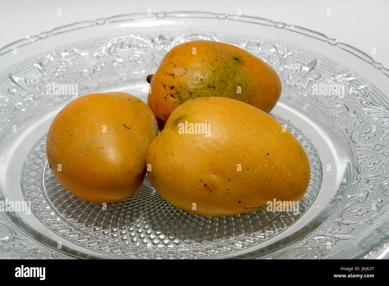Three mangoes hi-res stock photography and images - Alamy