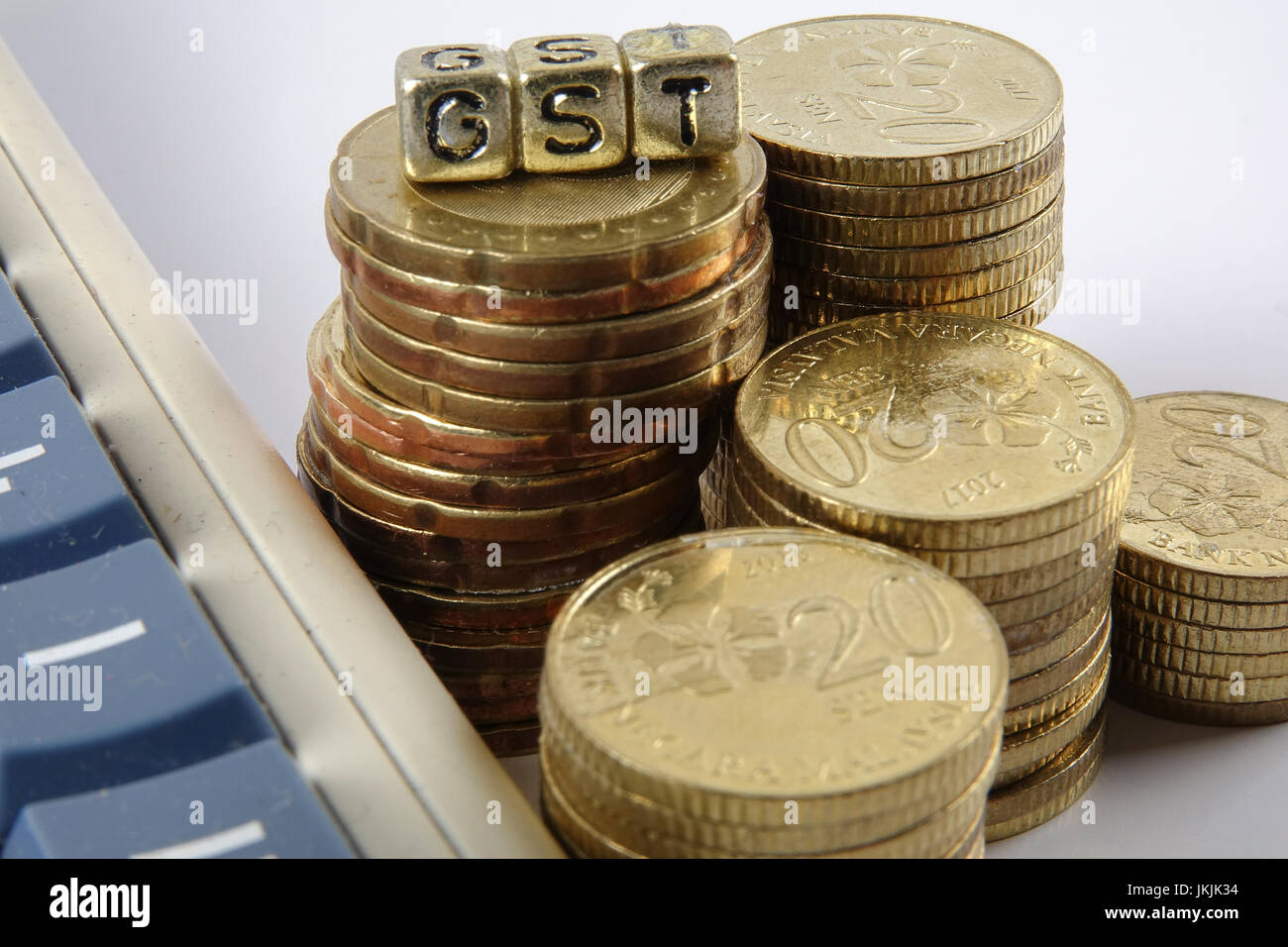 GST wording and gold coins Stock Photo - Alamy