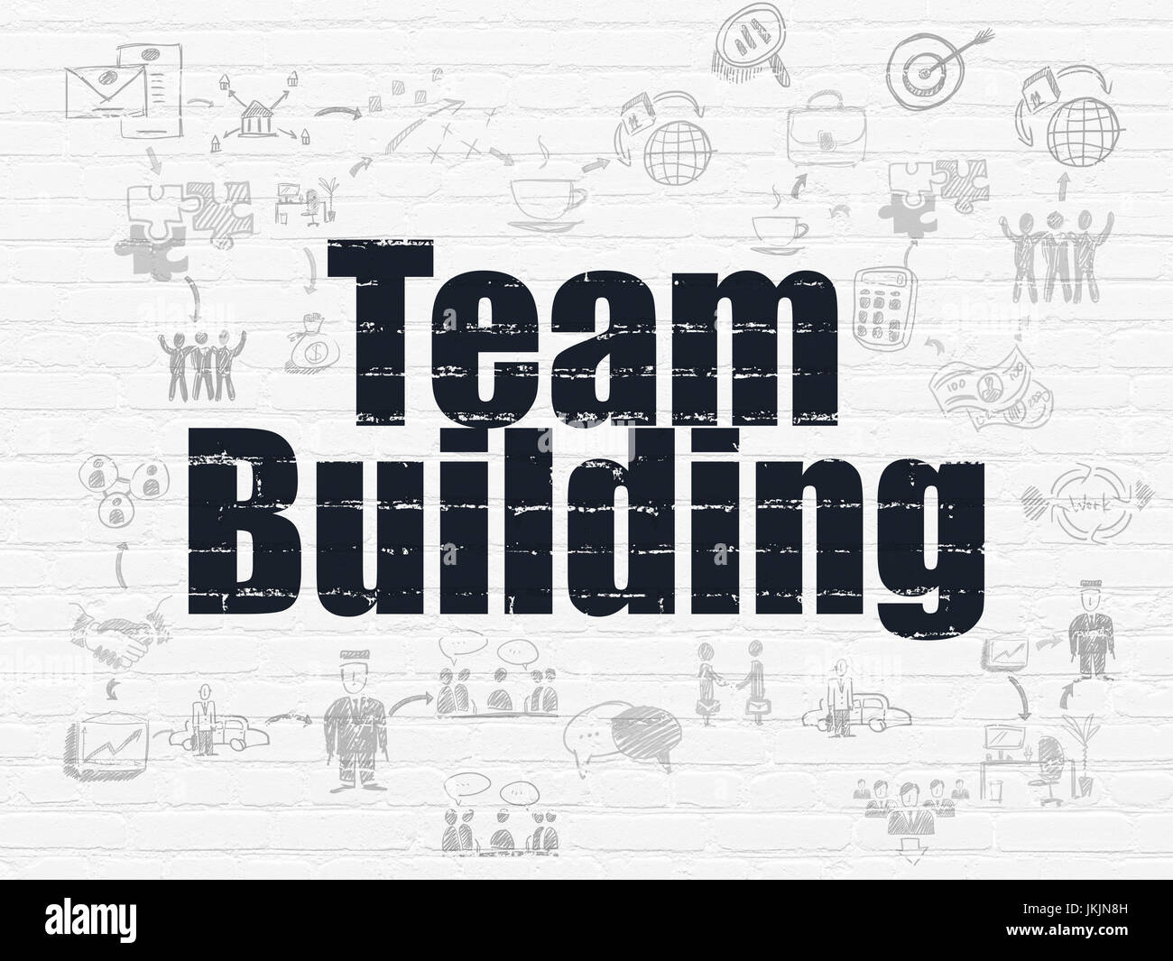 Finance concept: Team Building on wall background Stock Photo - Alamy