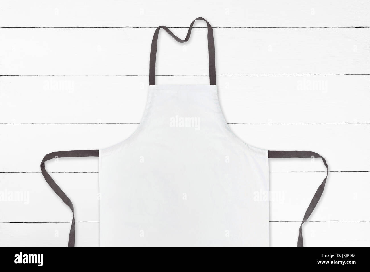 White apron on white wooden texture Stock Photo - Alamy