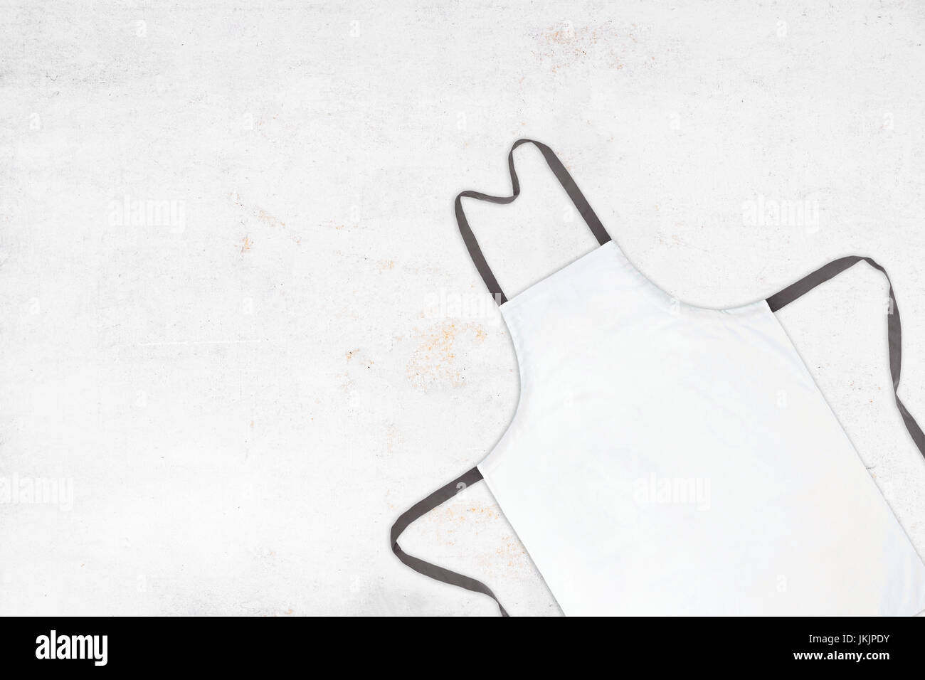 White apron on old white texture with copyspace Stock Photo - Alamy