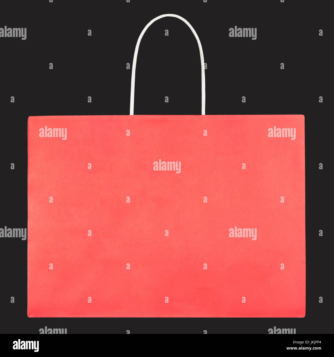 Red shopping paper bag on black texture Stock Photo - Alamy