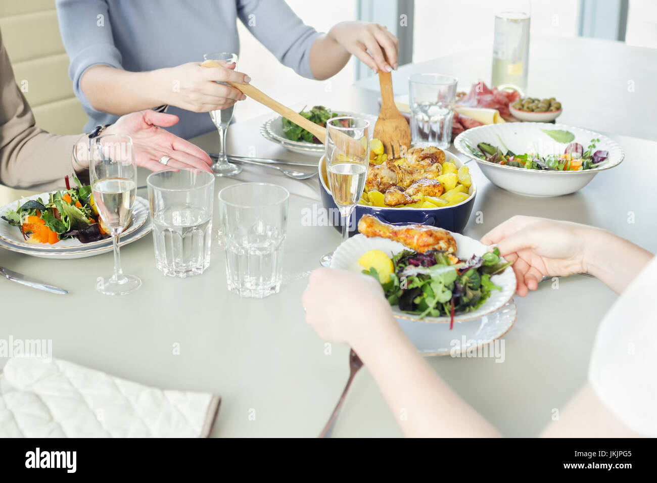 Young women enjoying dinner hi-res stock photography and images - Alamy