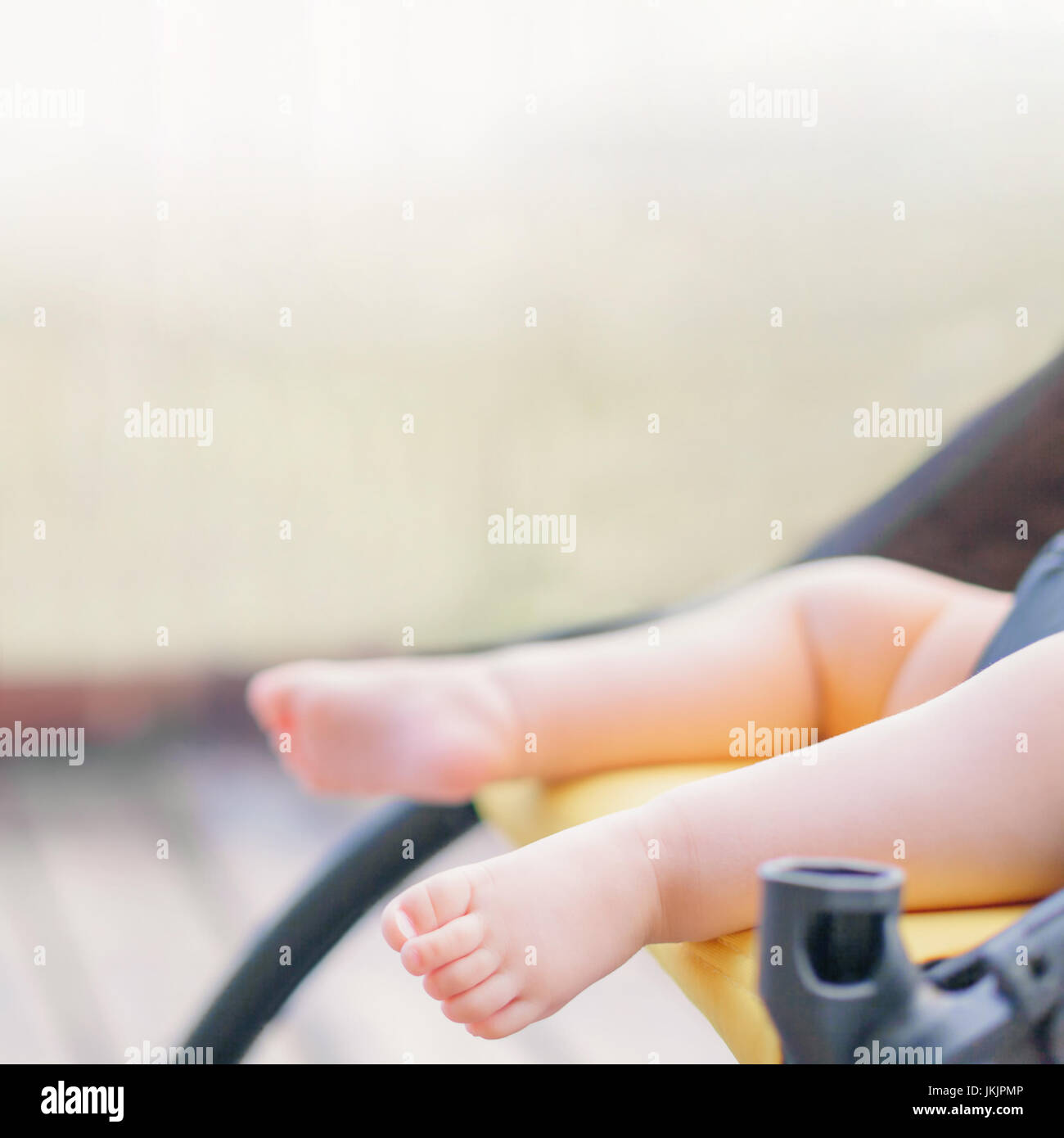 Baby sleeping in stroller hi-res stock photography and images - Alamy