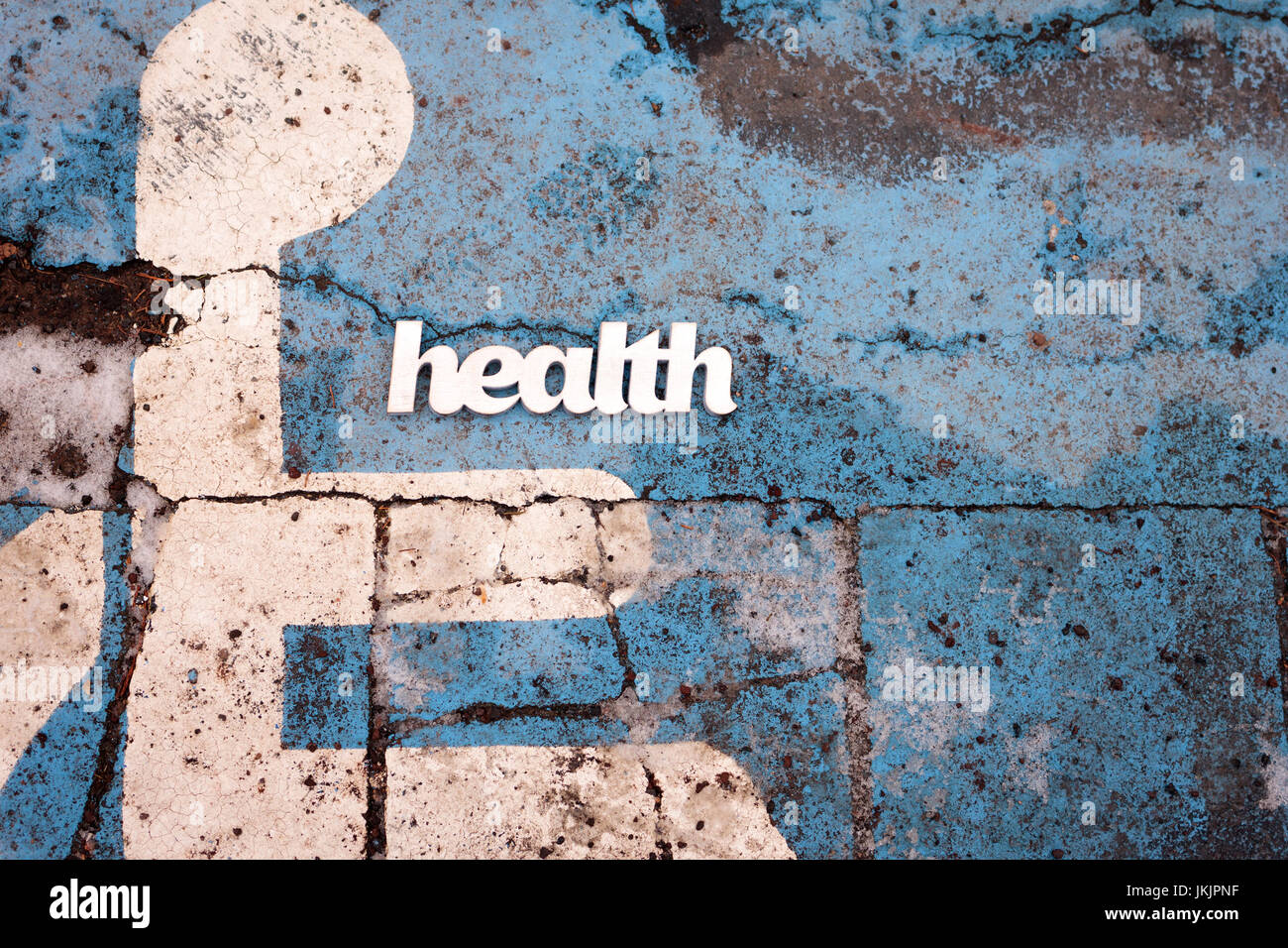 Health sign on old pavement background Stock Photo - Alamy