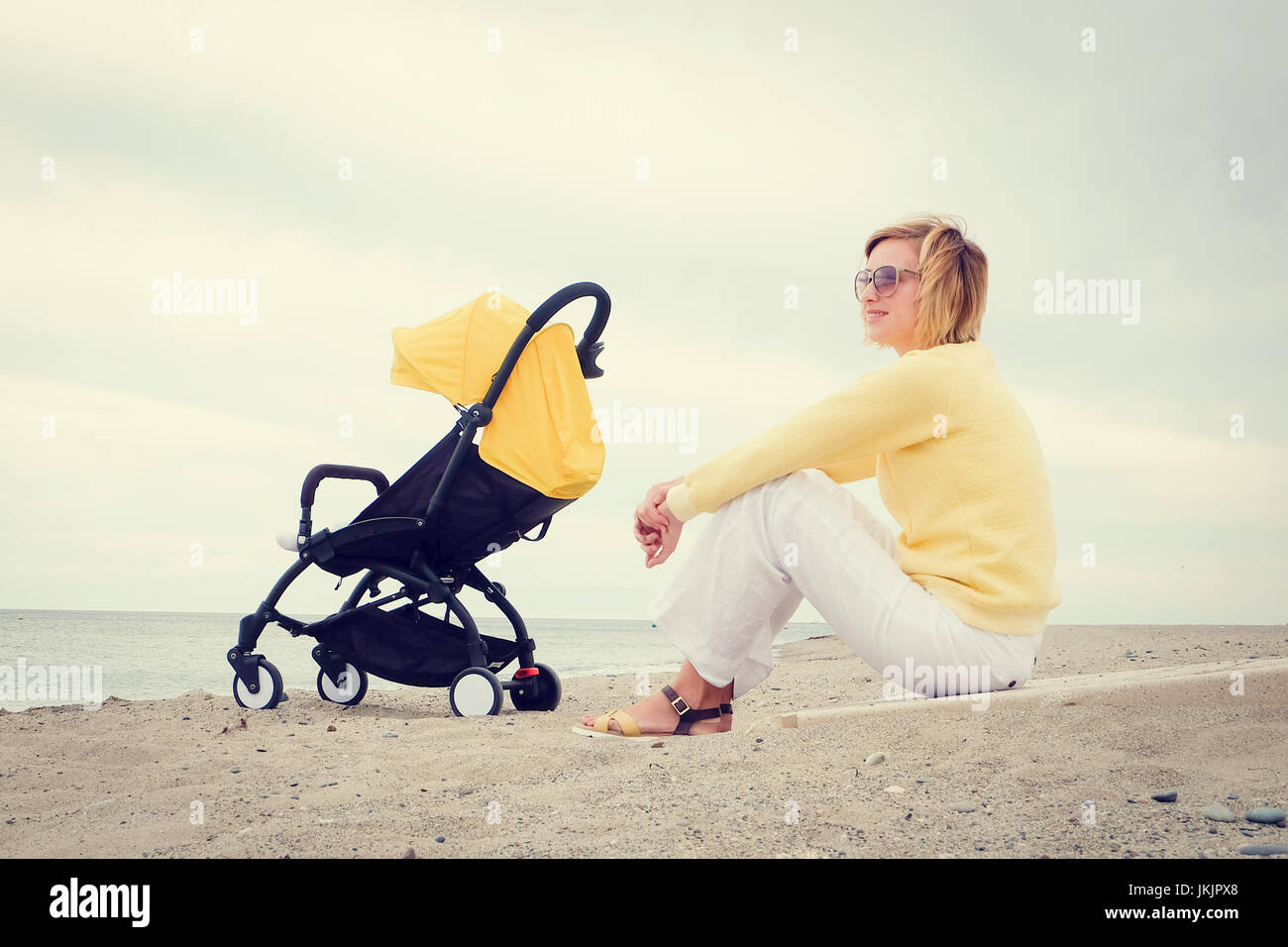 Mother baby stroller enjoying motherhood hi-res stock photography and ...
